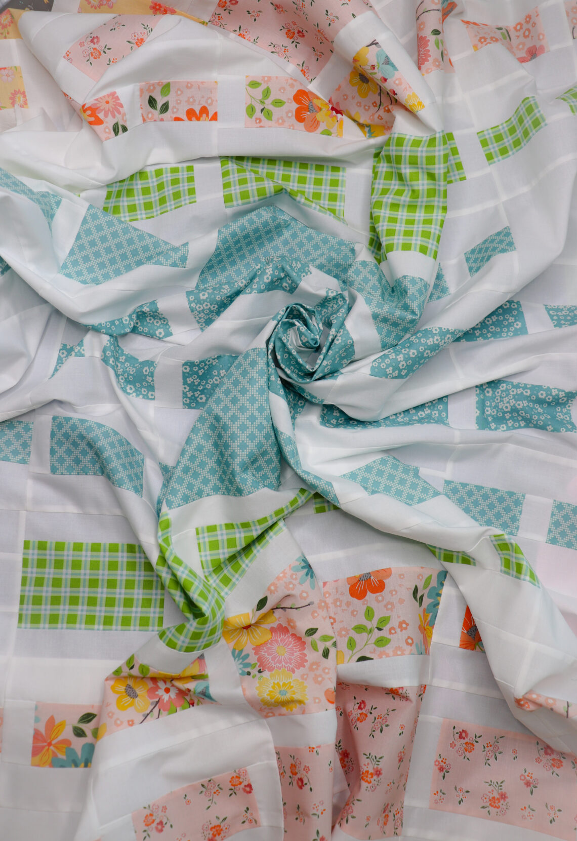 The Aftershock Quilt with Spring's in Town