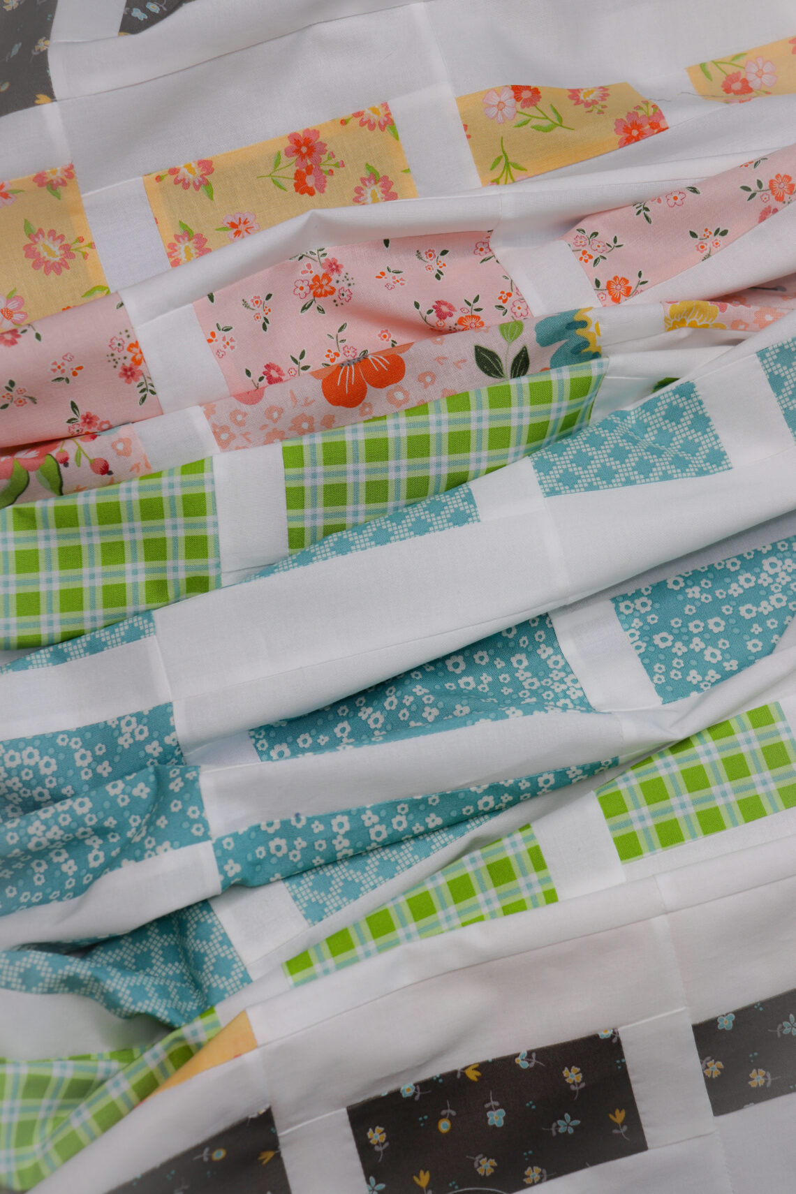 The Aftershock Quilt with Spring's in Town