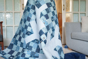 A Modern Handcraft Snowflake Quilt with the Winter Magic Collection