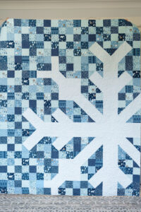 A Modern Handcraft Snowflake Quilt with the Winter Magic Collection
