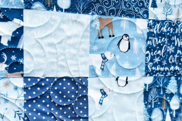 A Modern Handcraft Snowflake Quilt with the Winter Magic Collection