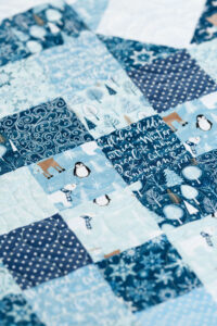 A Modern Handcraft Snowflake Quilt with the Winter Magic Collection