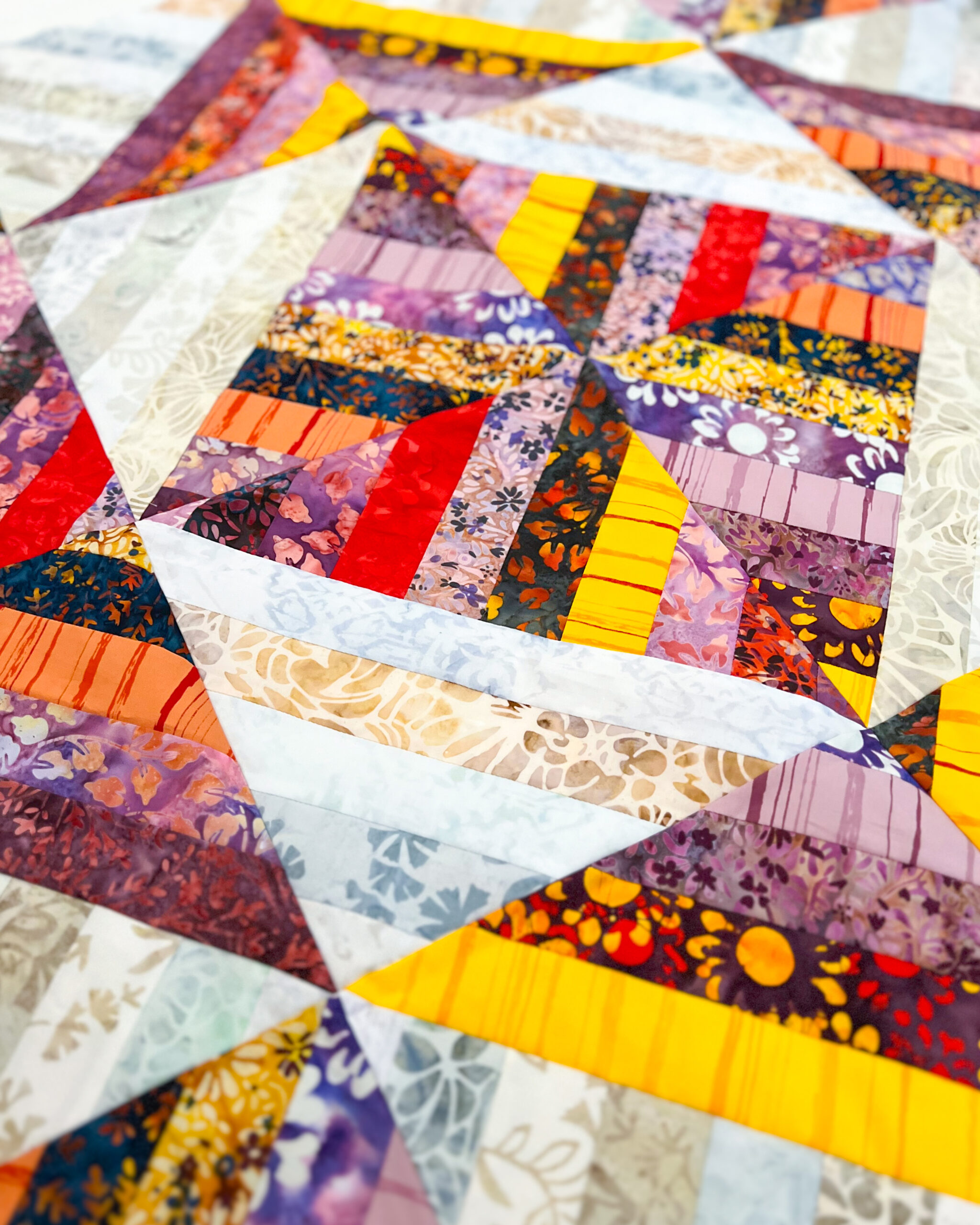 Porcelains and Wildflowers - Twist of a Classic String Quilt