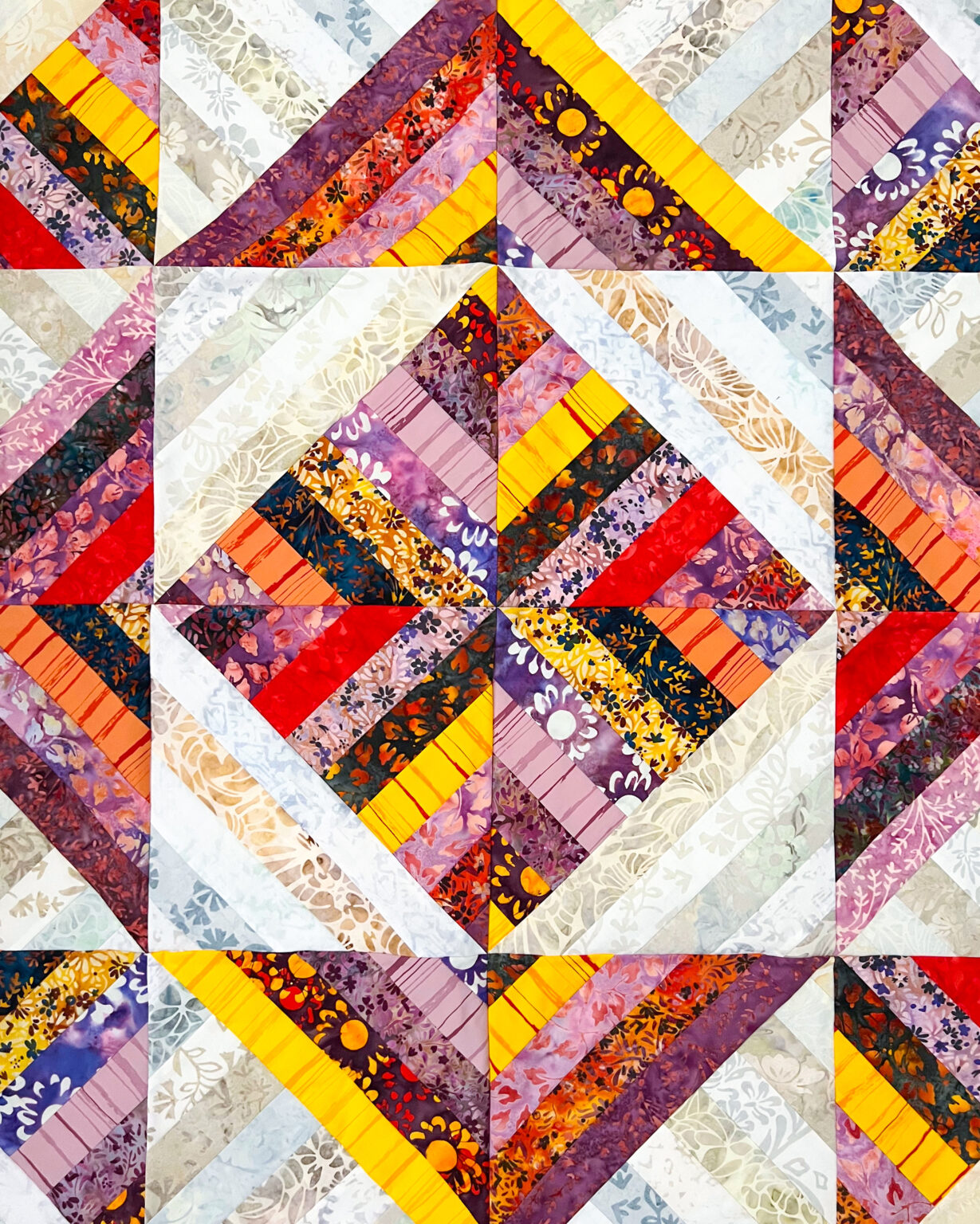 Porcelains and Wildflowers - Twist of a Classic String Quilt
