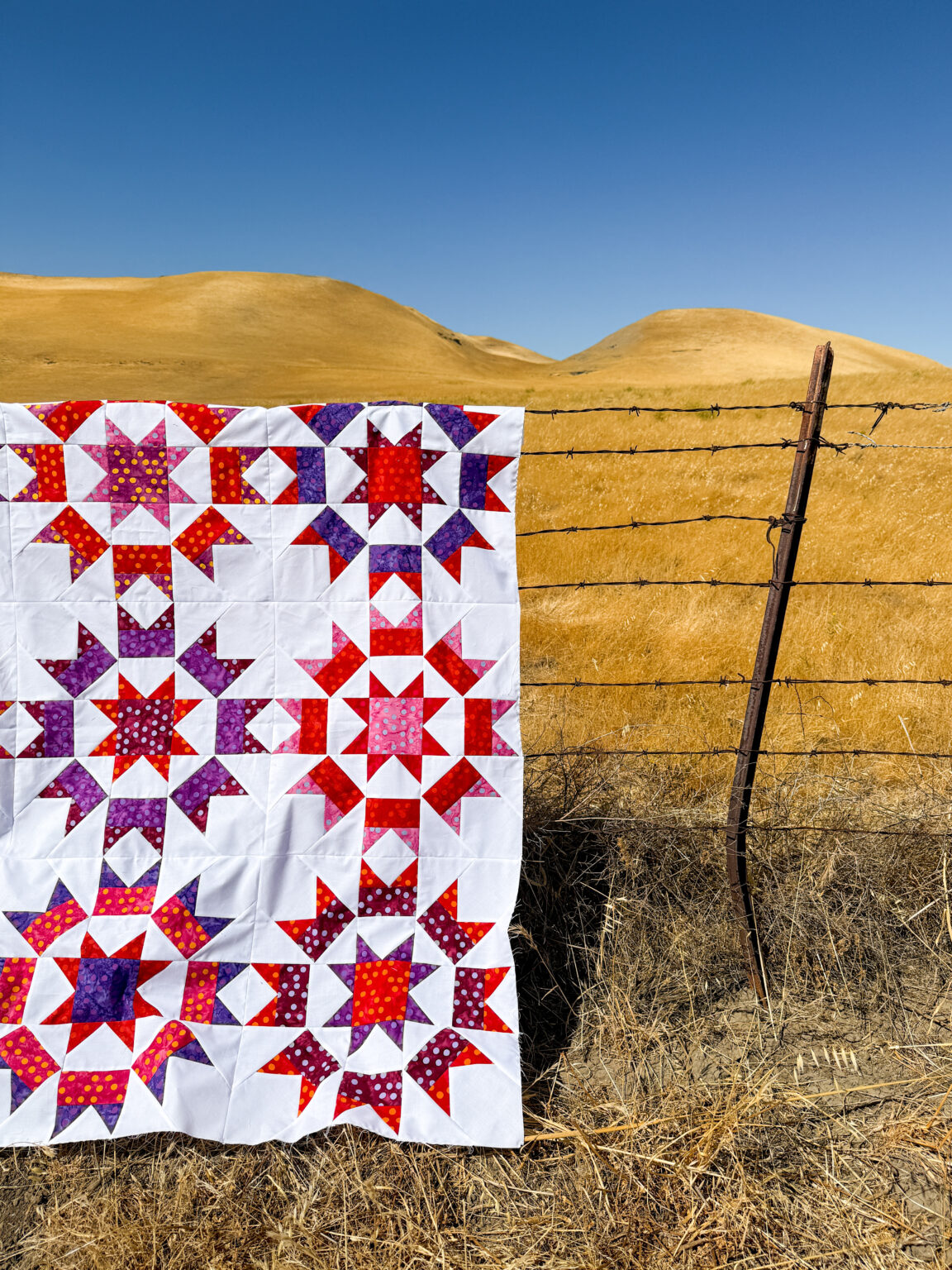 The Star Go Round Quilt with Polka Pop Batiks: A Burst of Colorful Fun!